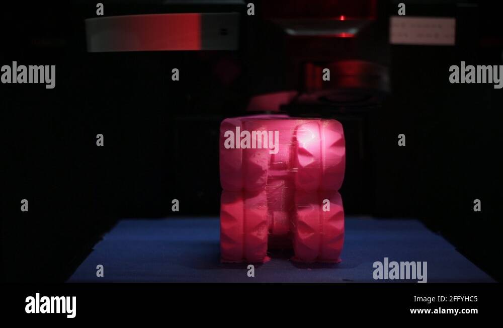 3D printer printing a pink object Stock Video Footage - Alamy