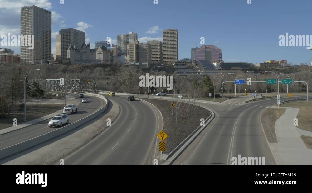 Edmonton Skyline on a clear day as traffic flows over Low Level Bridge ...