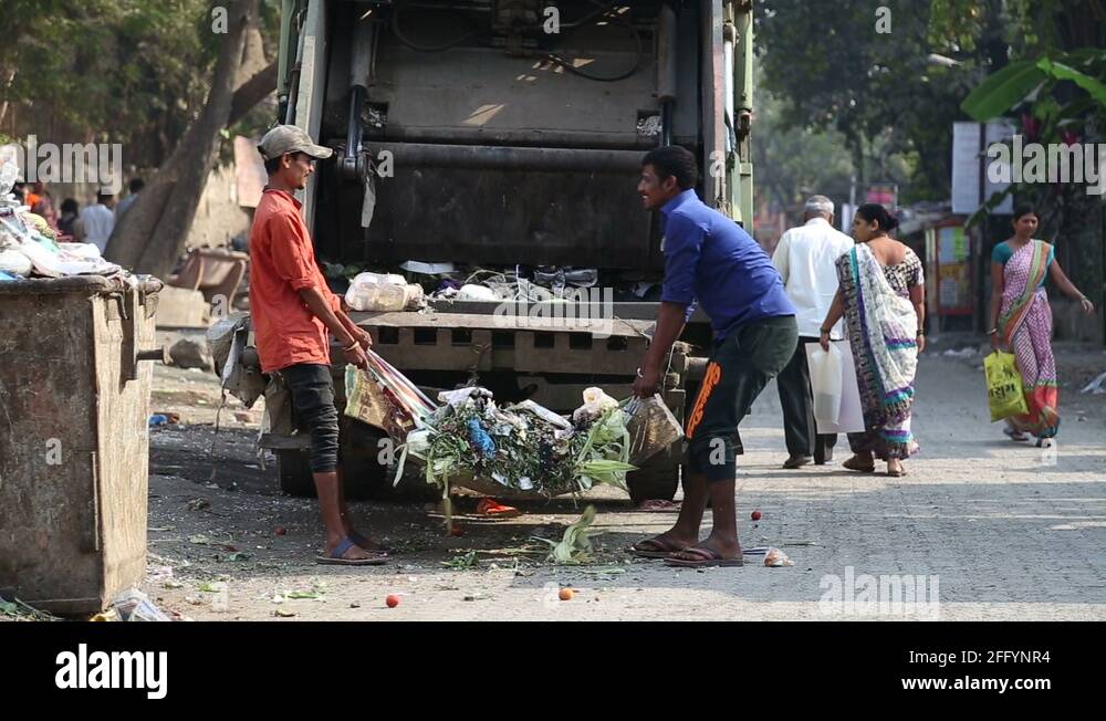 Garbage men in india Stock Videos & Footage - HD and 4K Video Clips - Alamy