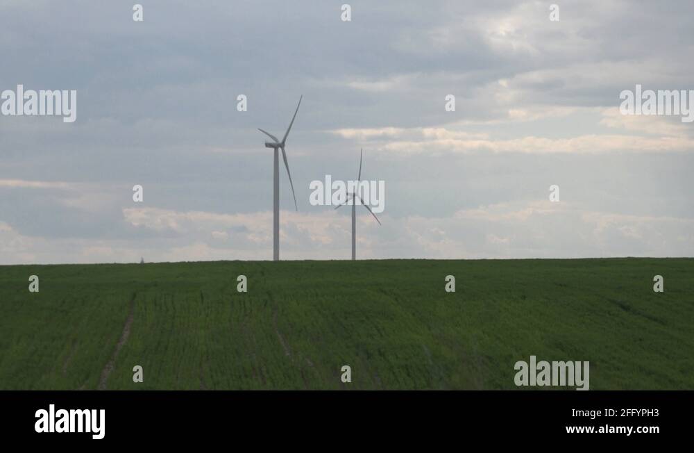 Wind turbines are on horizon of night sky twist propellers, 4k Stock ...