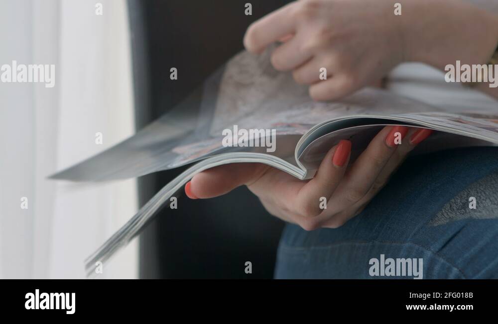 Hands holding magazine cover Stock Videos & Footage - HD and 4K Video ...