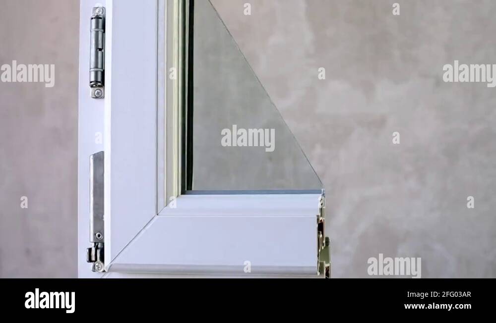 Rotating sample of PVC window in room with concrete wall Stock Video ...