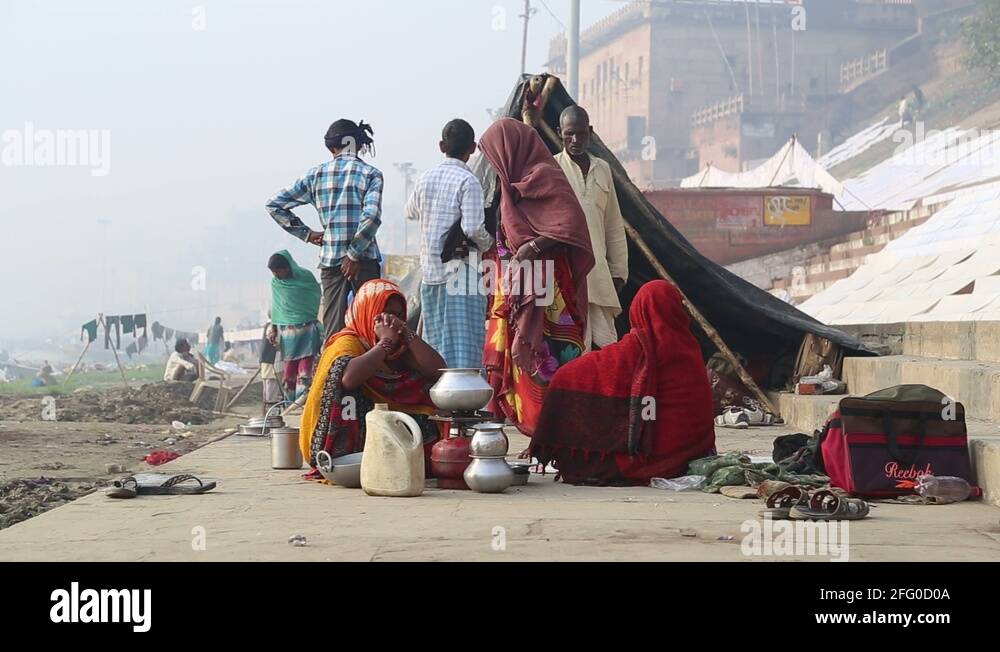 Local Indian people at ghats of the Ganges river in India Stock Video ...