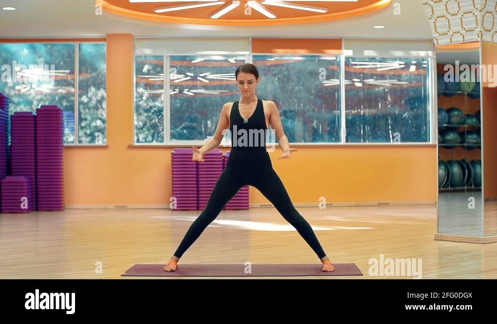 Wide stance forward bend Stock Videos & Footage - HD and 4K Video Clips ...