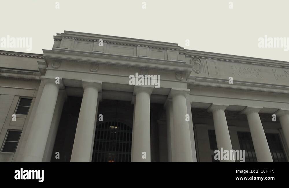 Tall pillars of Union Station in Toronto exterior pan down Stock Video ...