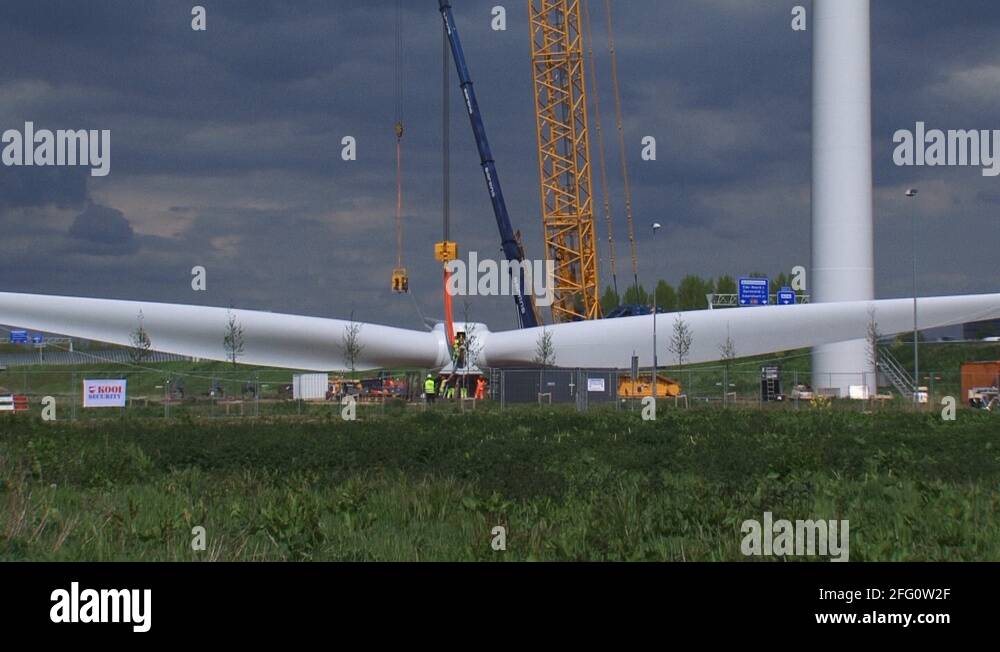 Preparation for hoisting the rotor blades of a wind turbine Stock Video ...