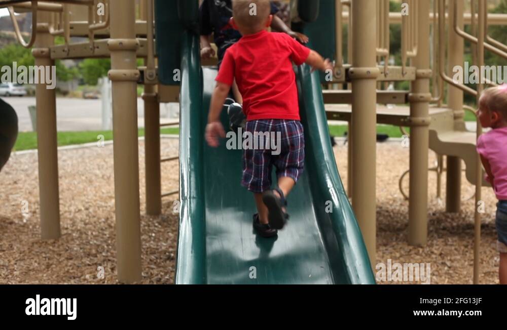 Boy climbing slide playground boys Stock Videos & Footage - HD and 4K ...