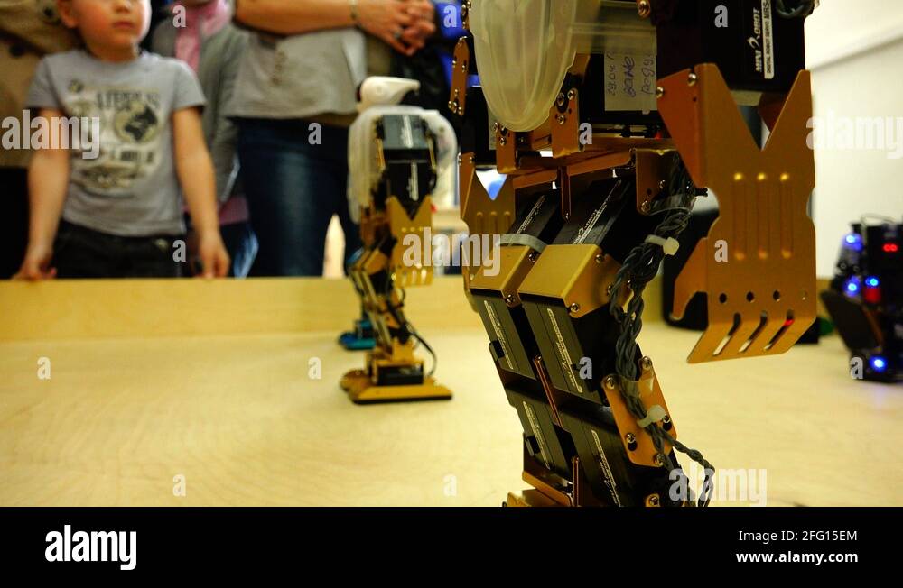 Robot. AI. Children playing with robots Stock Video Footage - Alamy