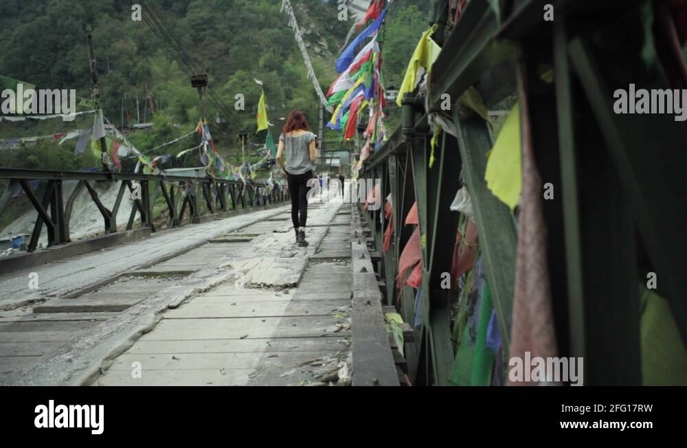 Girl walking over bridge Stock Videos & Footage - HD and 4K Video Clips ...