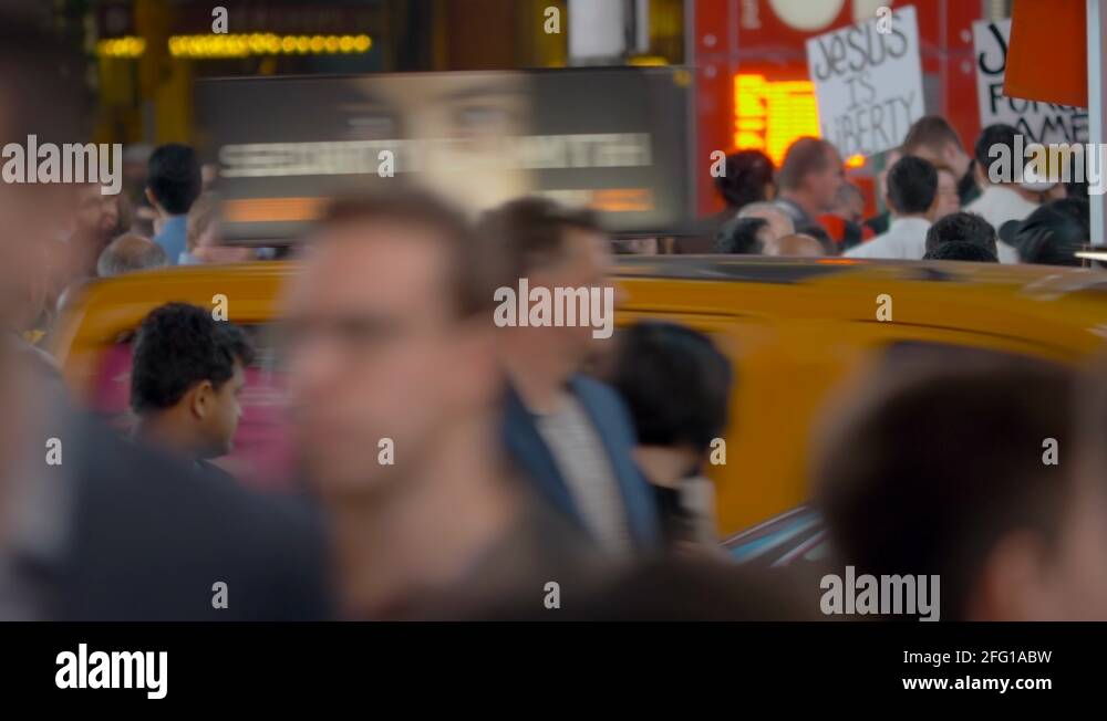 Pedestrians on a crowded congested street on Times Square, NYC, night ...