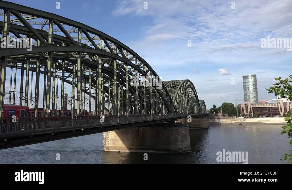 ULTRA HD 4K Local train pass Hohenzollern bridge Koln landmark cross ...