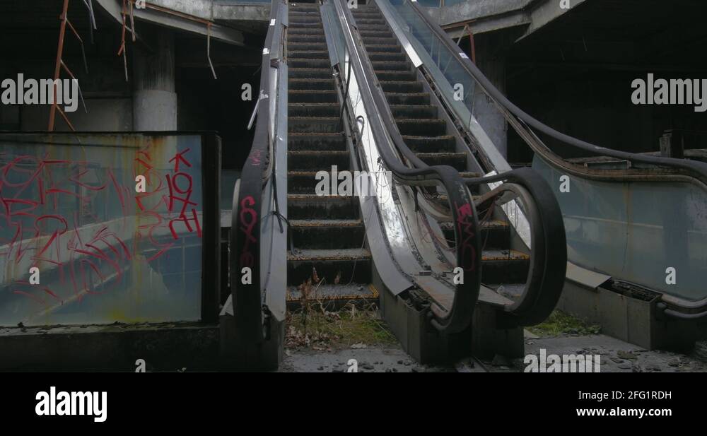 Apocalyptic background of abandoned shopping mall with broken ...