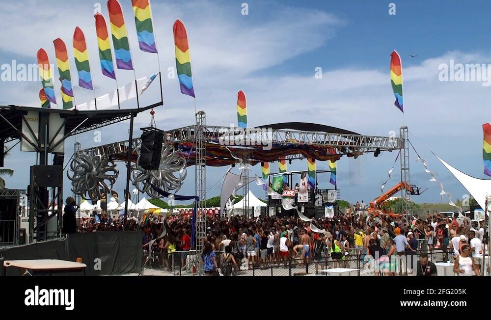Crowd people at the open air disco stage of the Miami Beach Gay Pride ...