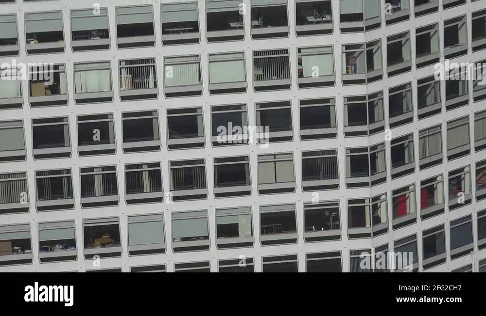 ULTRA HD 4K Tilt up office building skyscraper residential block ...