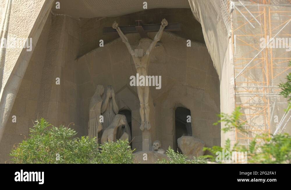 Jesus Christ crucified statue on Sagrada Familia, Barcelona Stock Video Footage - Alamy