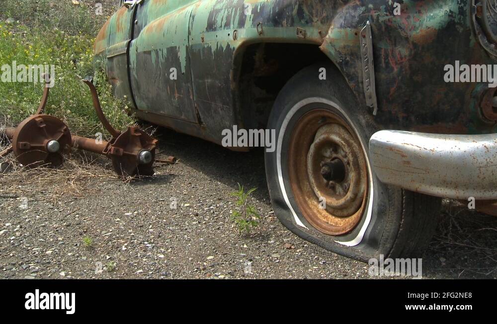 old wrecks, cars 1950s detail, pan reveal, rust and patina Stock Video ...