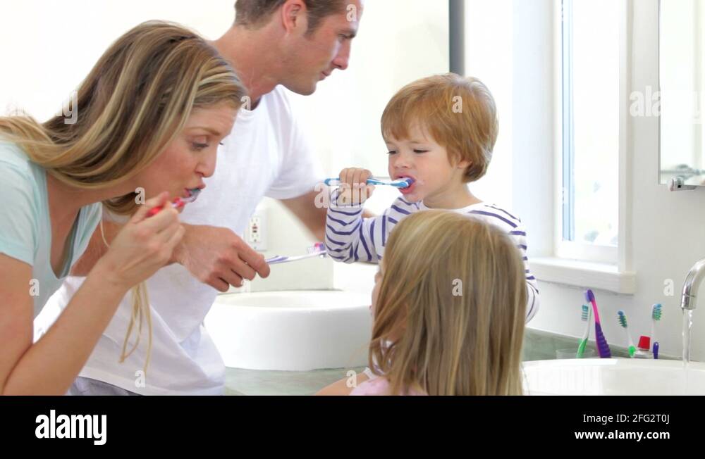 Happy family brushing teeth together Stock Videos & Footage - HD and 4K ...