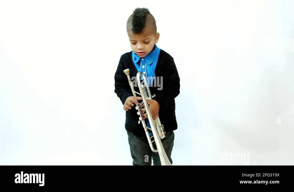 Boy holding trumpet Stock Videos & Footage - HD and 4K Video Clips - Alamy
