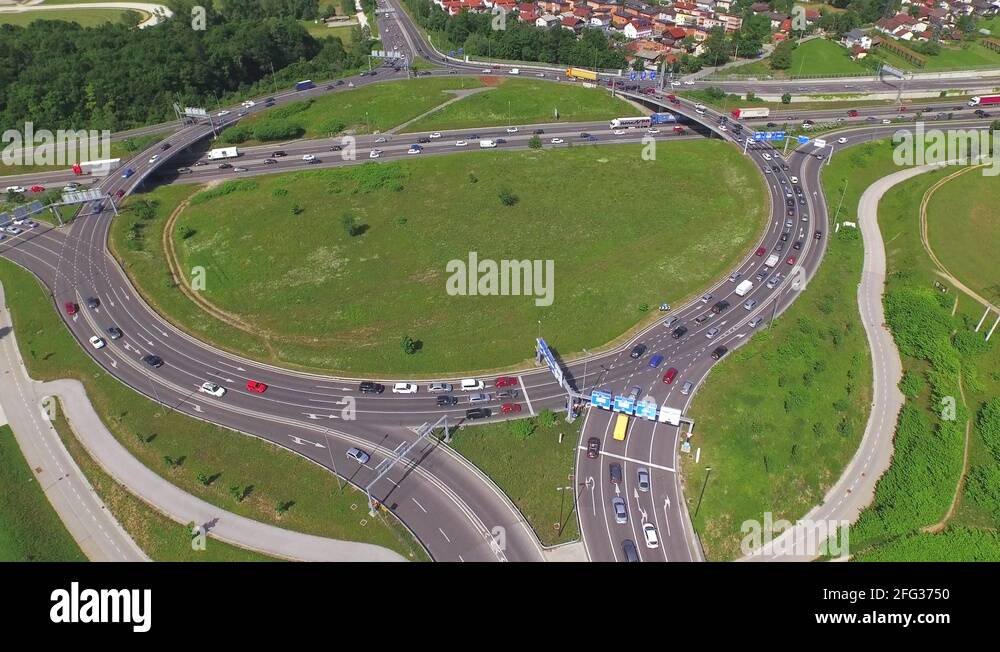 AERIAL: Big multi-lane roundabout intersection in highway junction ...