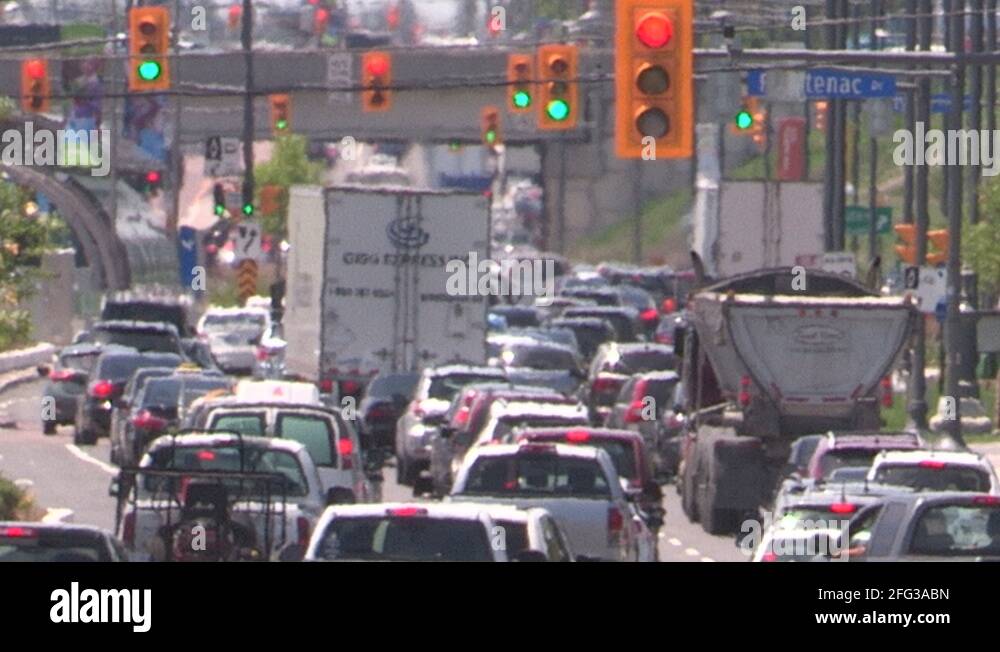 Traffic jam and gridlock on severe hot day with heat waves rising from ...