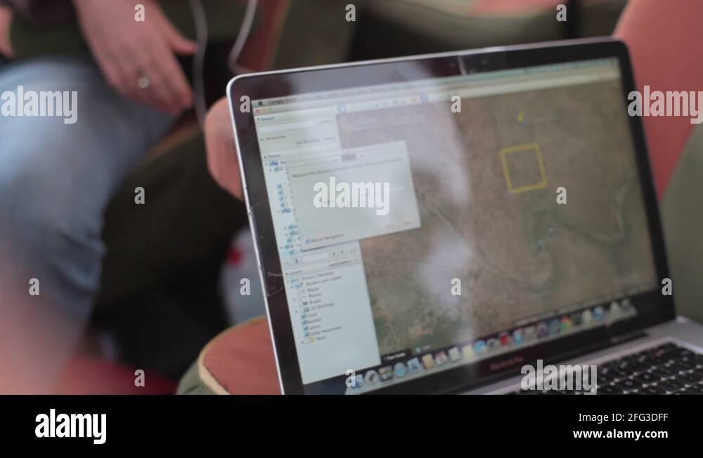 Designing land on google earth computer map, close up, shallow DOF ...