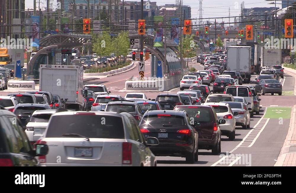 Traffic jam and gridlock on severe hot day with heat waves rising from ...