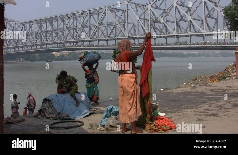 Indian woman and children in the Ganges in India Stock Video Footage ...