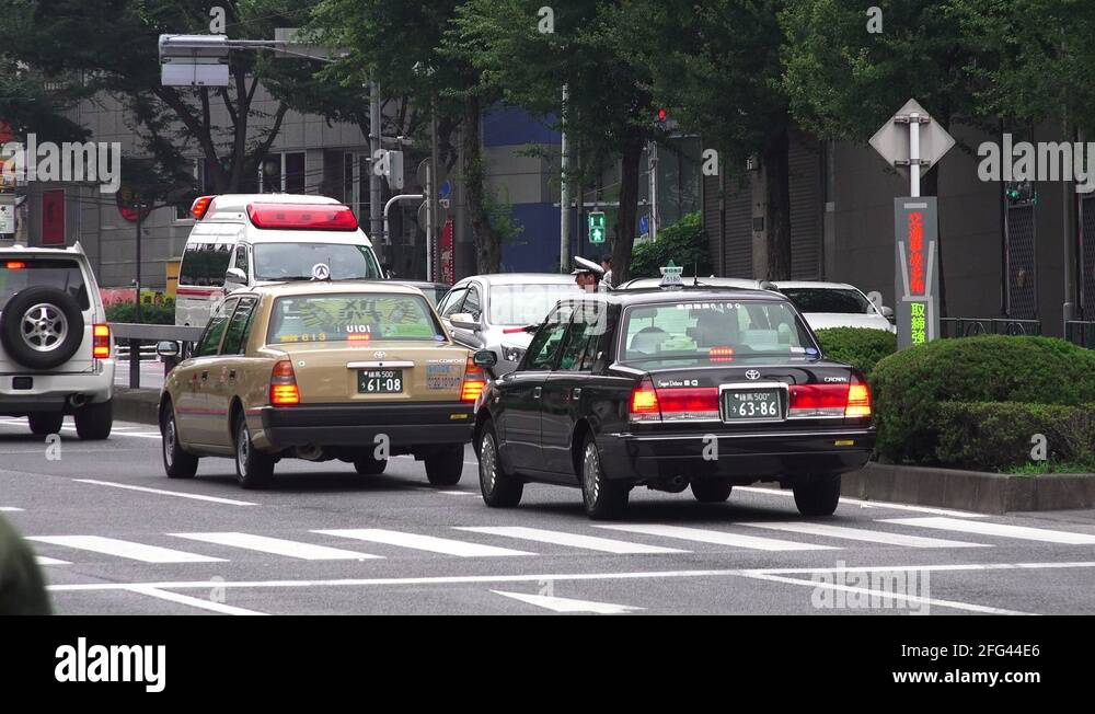Japanese Ambulance On Busy City Streets In Shinjuku Tokyo Stock Video ...