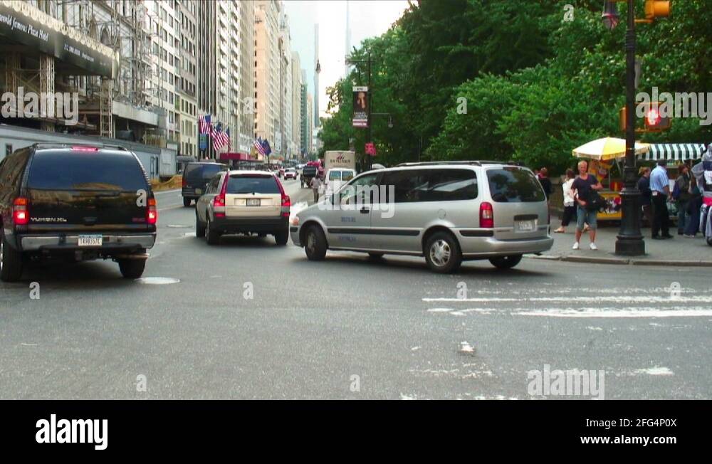 Street corner in New York City with passing traffic Stock Video Footage ...