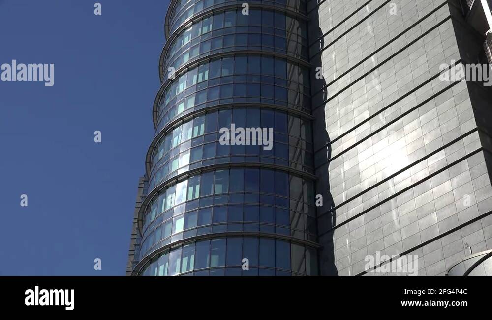 4K Closeup modern glass facade skyscraper design business tower ...