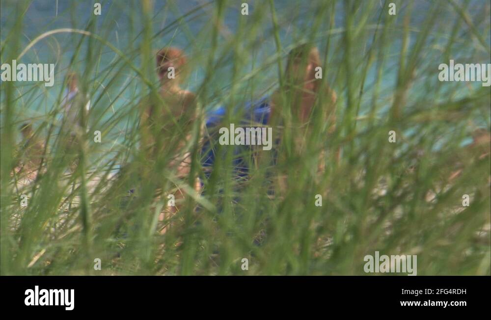 Women walking on a beach in Miami Stock Video Footage - Alamy