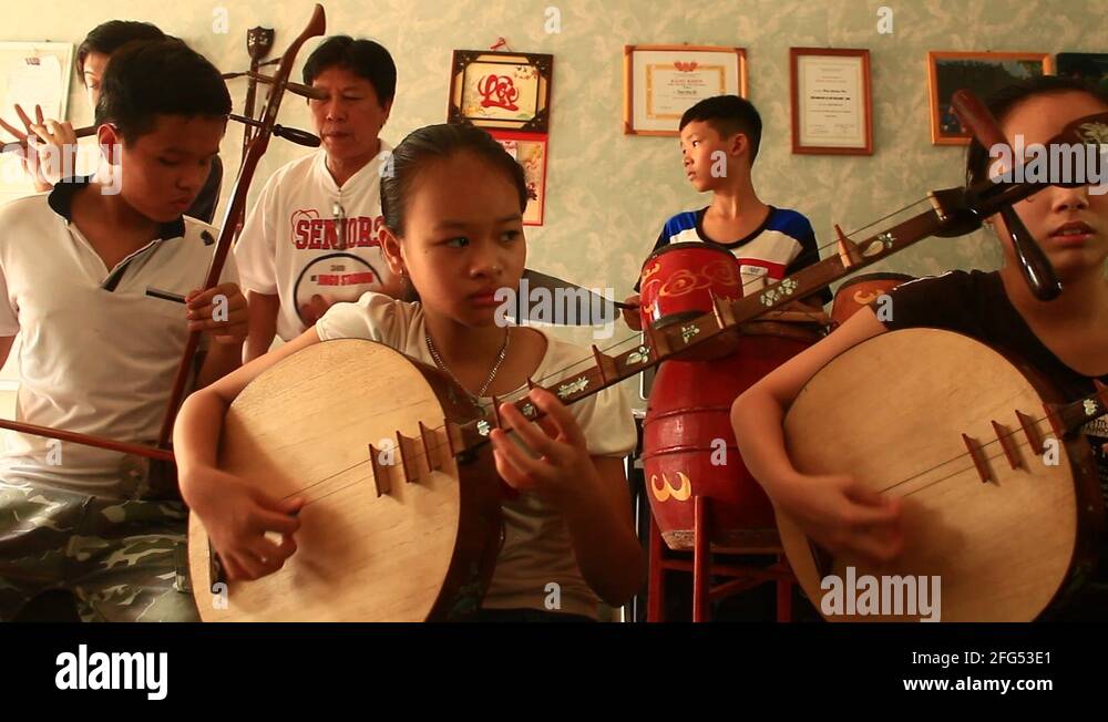 Asian children playing traditional instruments, Asia Stock Video ...