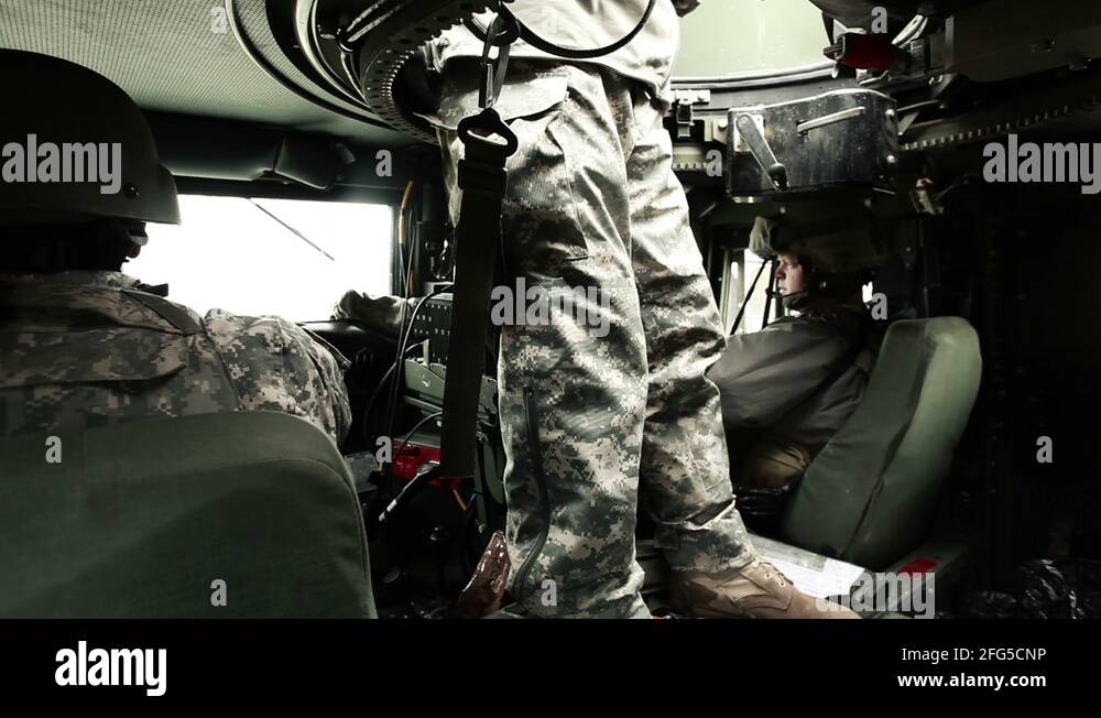 Shot of soldiers in a Humvee including the turret gunner Stock Video ...