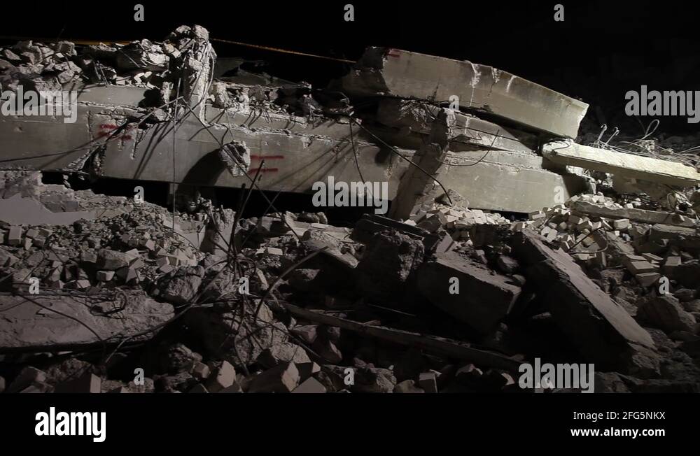 Rubble after earthquake, rocket attack, tsunami injured people under ...