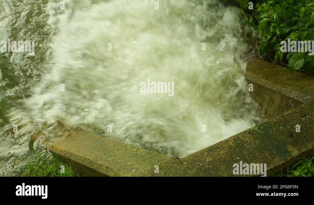 culvert overflow water flooding flood 2 Stock Video Footage - Alamy