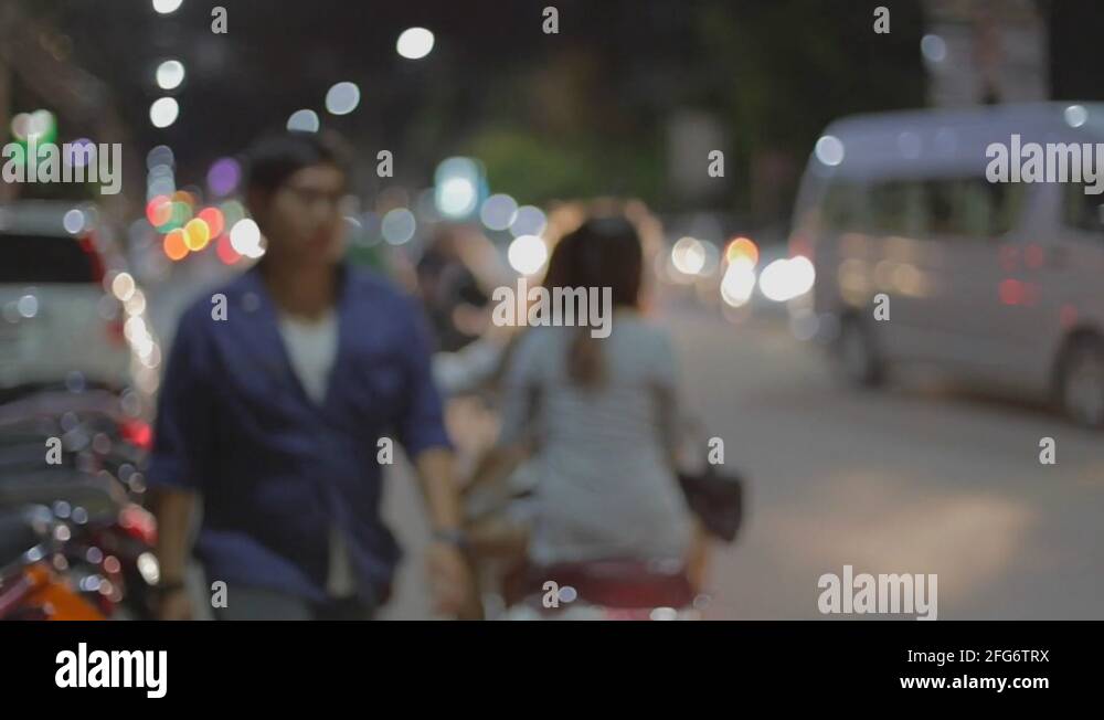young girls on scooter - nightlife Stock Video Footage - Alamy