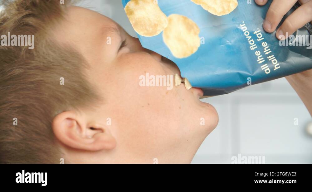 Packet of potato crisps Stock Videos & Footage - HD and 4K Video Clips ...