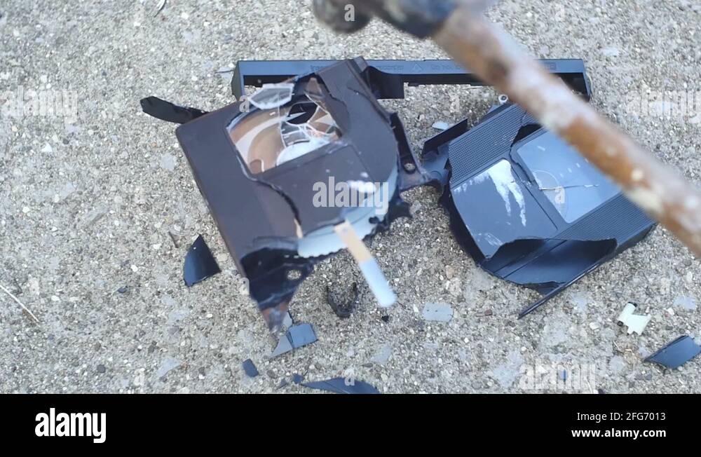 smashing VHS tape break hammer Stock Video Footage - Alamy