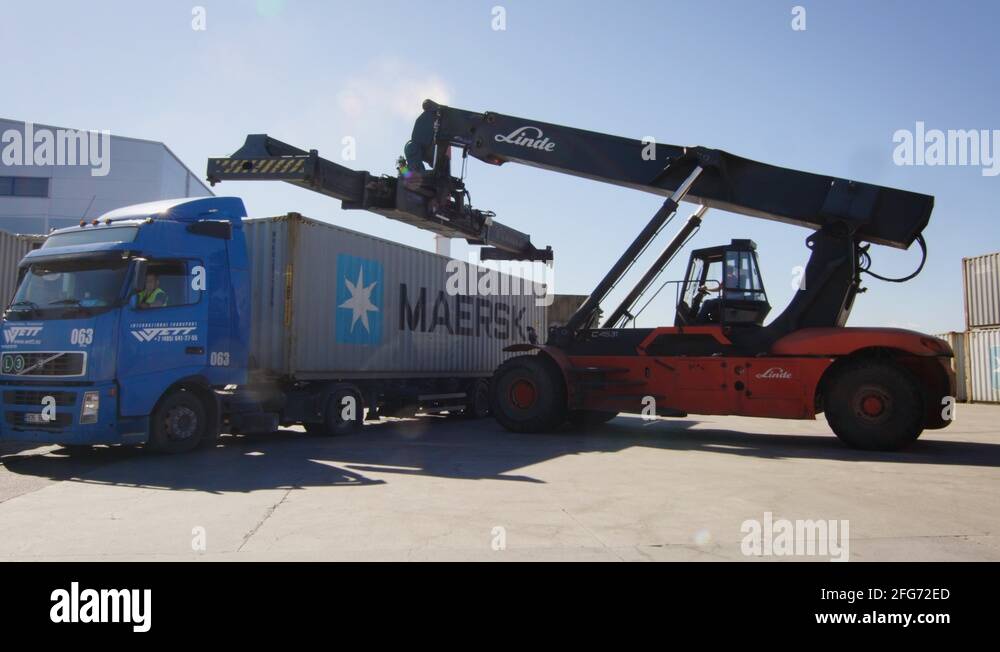 Container Handler is Loading Container onto Truck in Logistic Center ...
