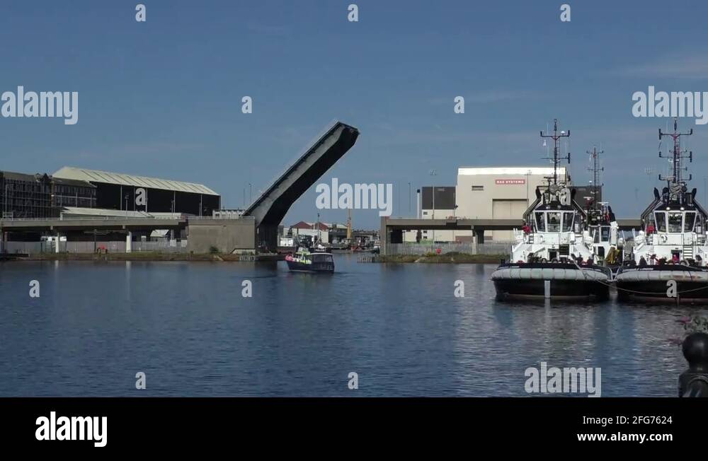Bridge lifting to allow submarine to leave Devonshire Dock Stock Video ...