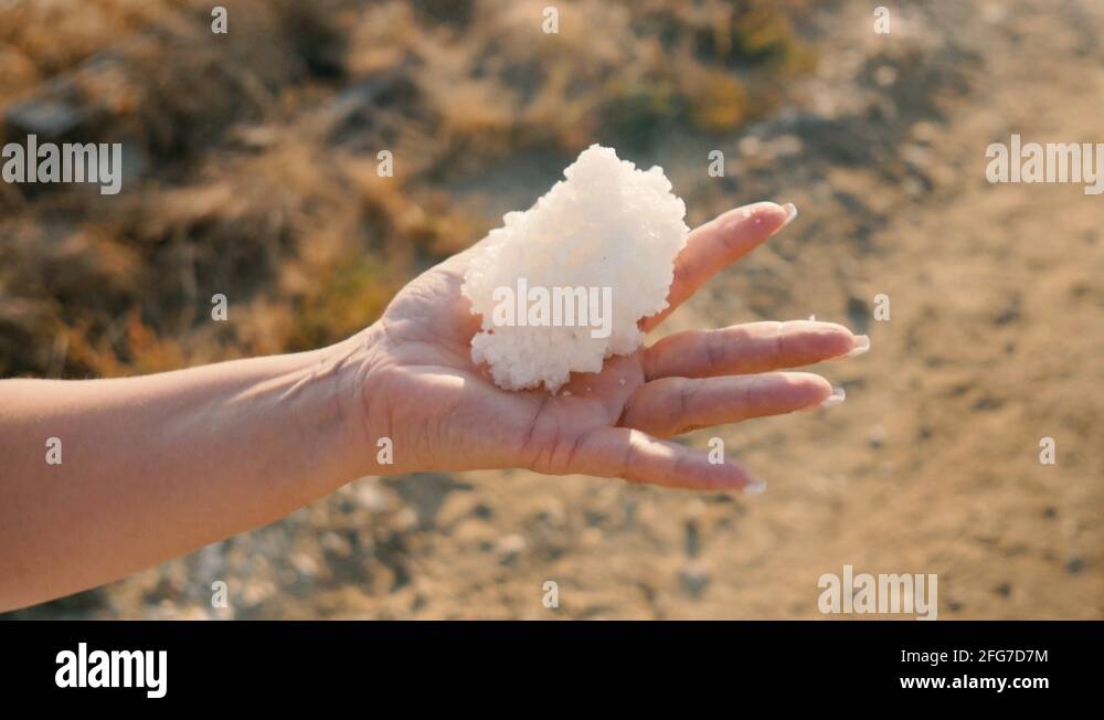 Hand holding salt Stock Videos & Footage - HD and 4K Video Clips - Alamy