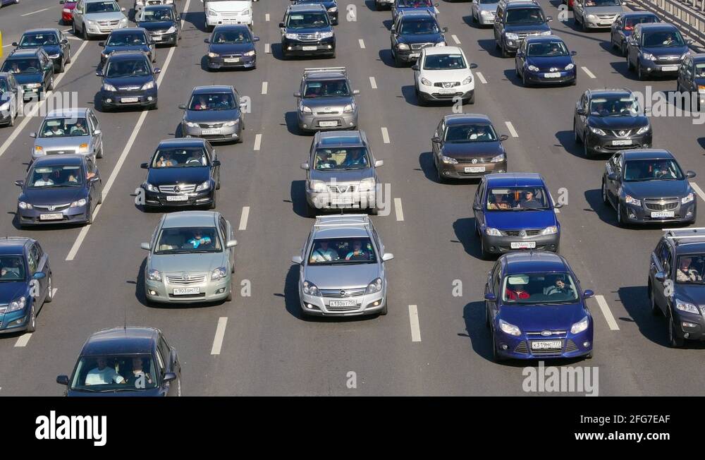Traffic jam, dense slow flow of cars on a freeway Stock Video Footage ...