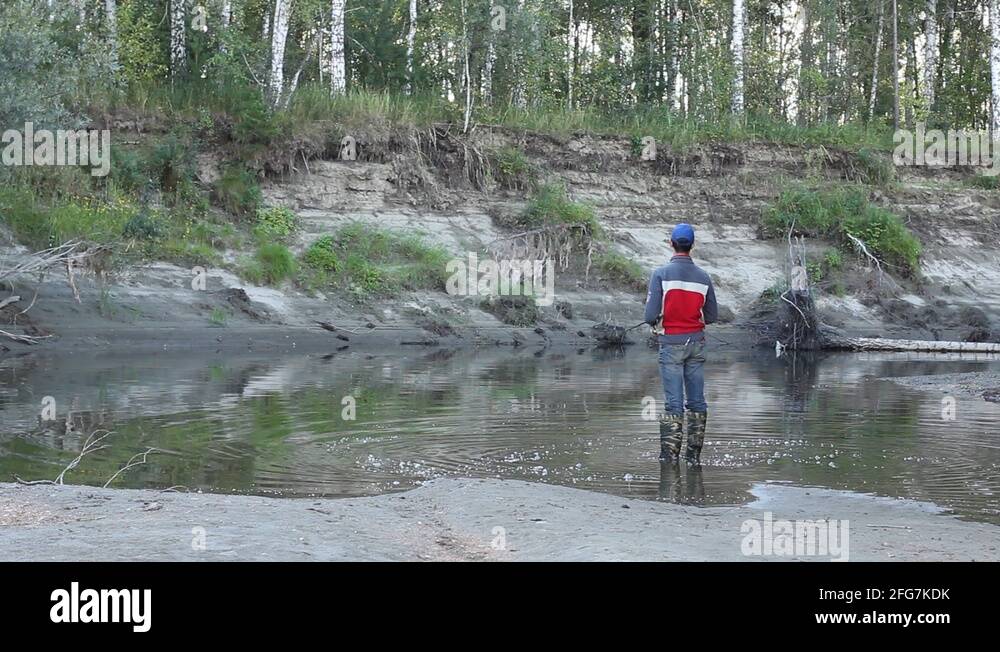 Fishing overalls Stock Videos & Footage - HD and 4K Video Clips - Alamy