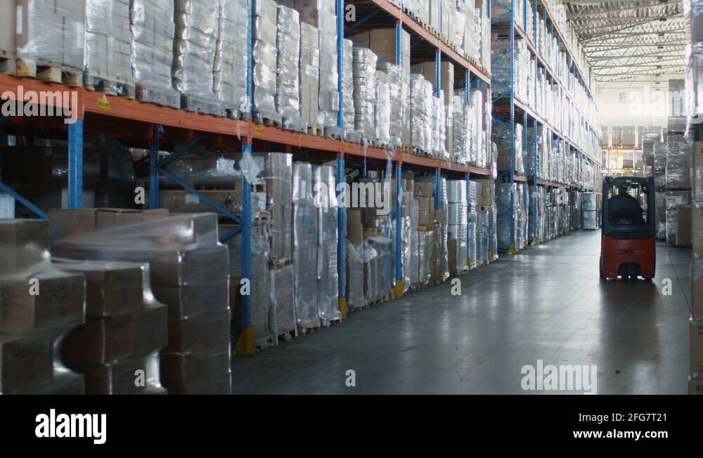 Forklift Loader is Moving Cargo Goods in Logistic Warehouse Stock Video ...