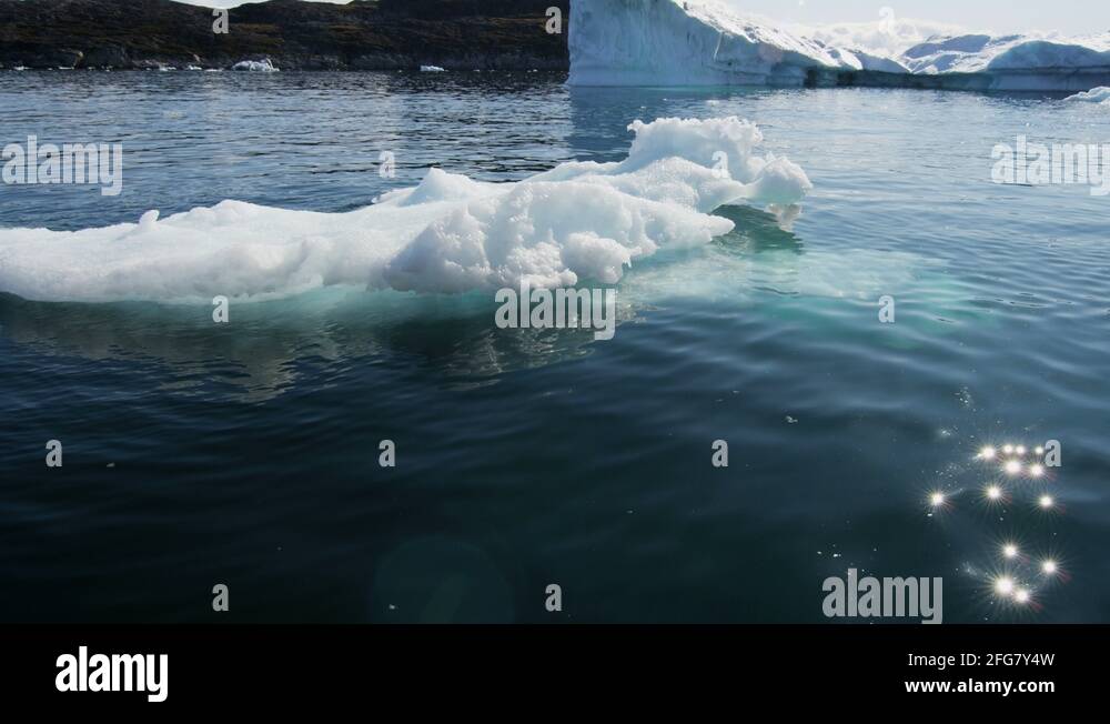 Floating glacial iceberg frozen water ocean climate change Stock Video ...