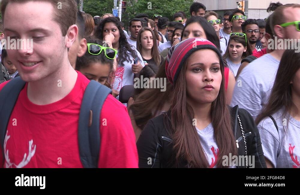 Crowds of diverse college and university students on campus in Toronto ...