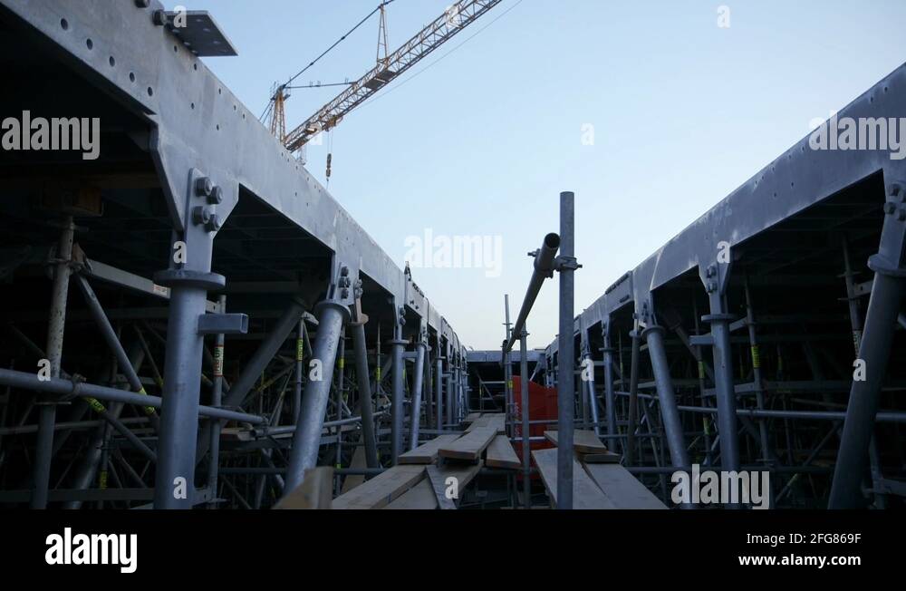 Industrial.Interior structure,of a big building.Scaffolding,work in ...