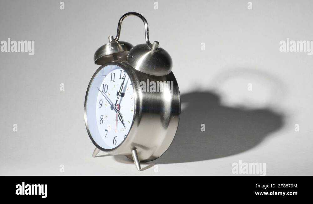 Twin Bell Silver Alarm Clock Ringing Loud Side View Isolated on White ...