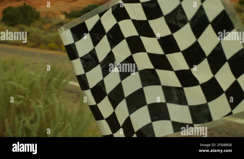 checkered flag race raceflag Stock Video Footage - Alamy