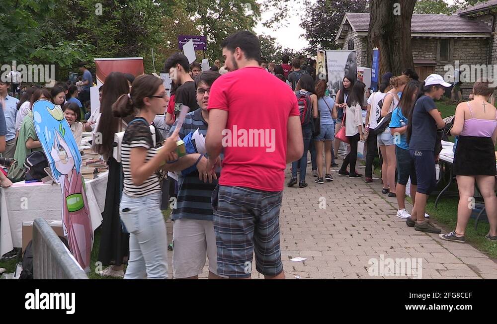 Crowds of diverse college and university students on campus in Toronto ...
